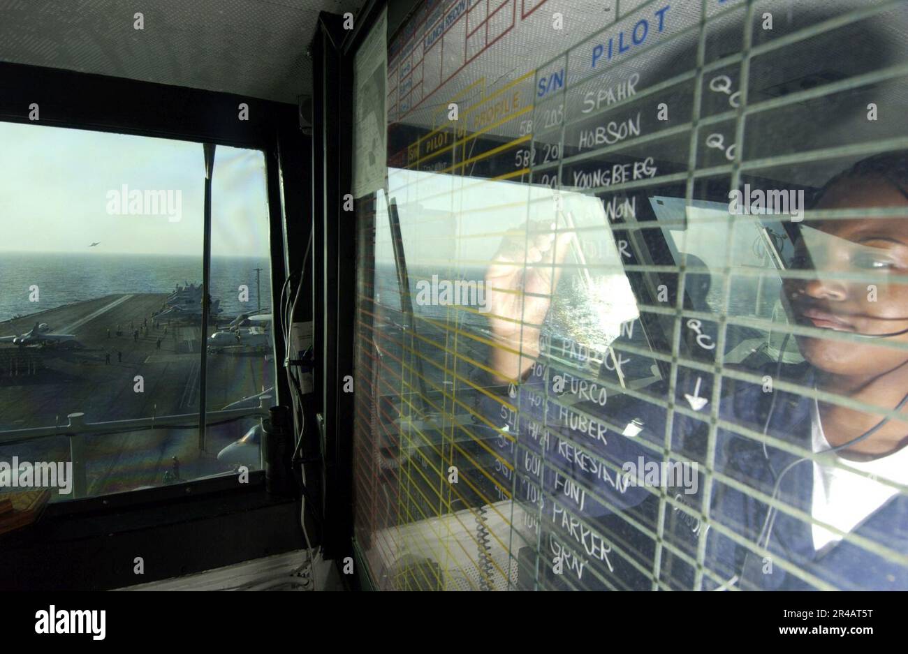 US Navy Airman records changes on the aircraft status board in Primary ...