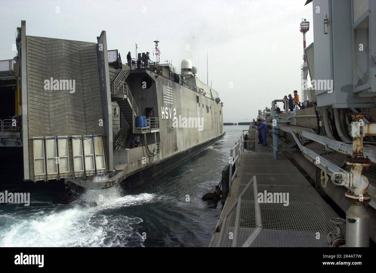 US Navy The High Speed Vessel Two (HSV 2) Swift maneuvers her way into ...