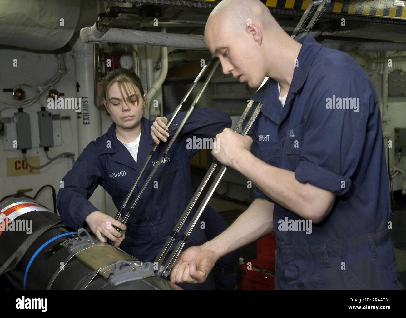 US Navy Torpedoman's Mate Seaman left, and Torpedoman's Mate place MK ...