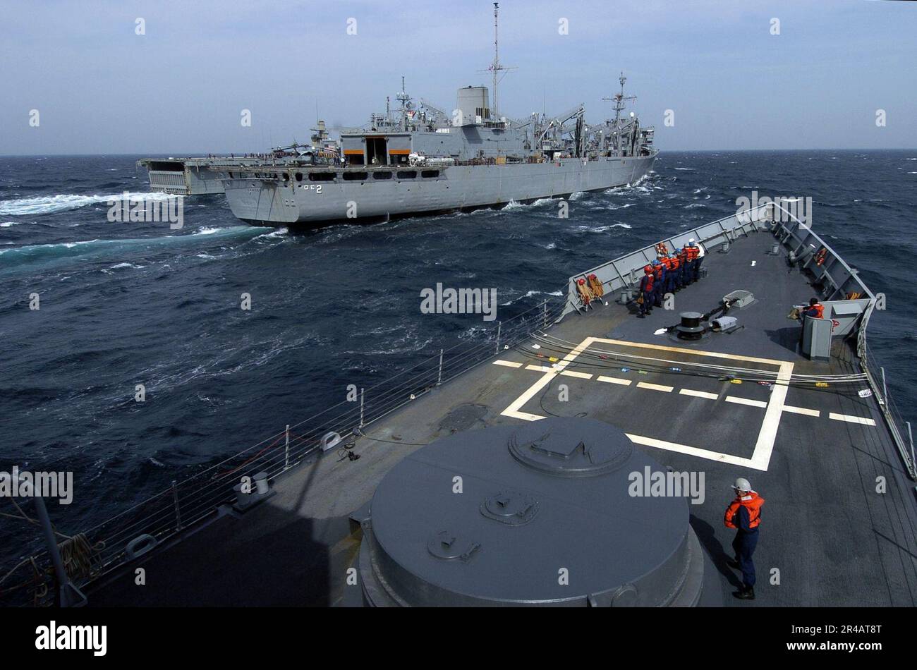 US Navy Crew members assigned to the guided missile frigate USS Thach ...