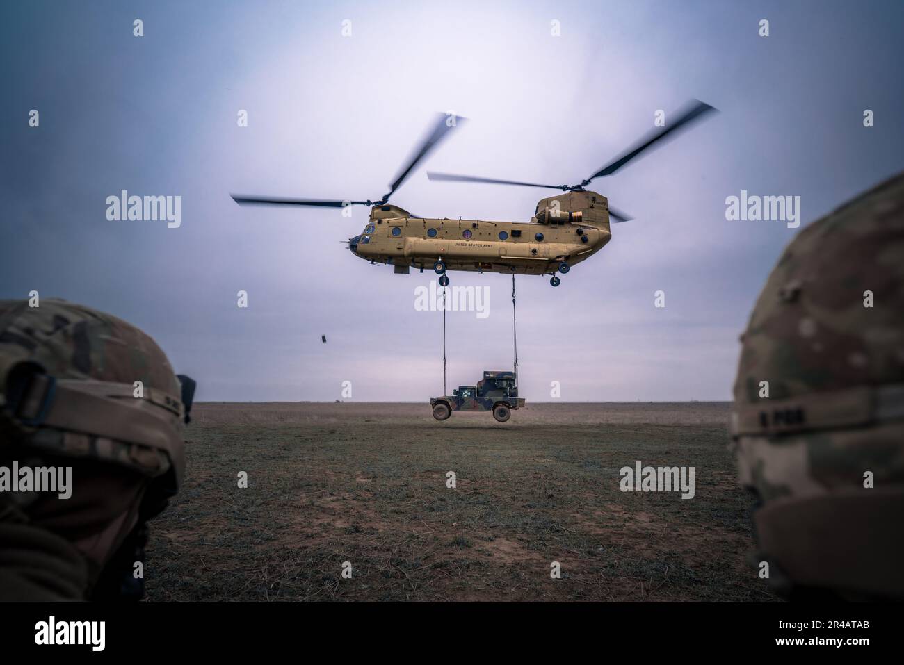 A U.S. Army Chinook lifts an Avenger weapon system during sling load ...