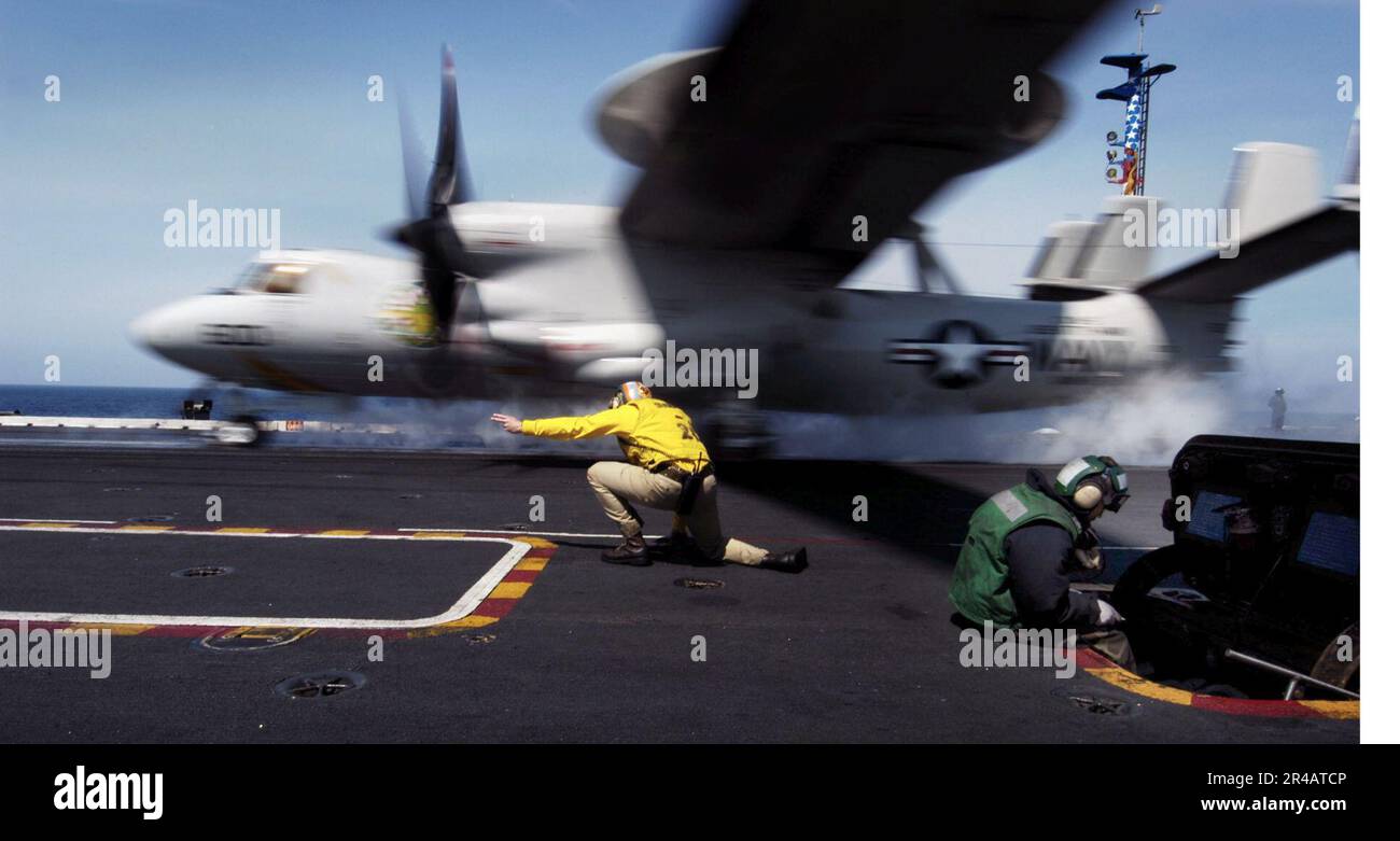 US Navy A catapult shooter launches an E-2C Hawkeye, assigned to the ...