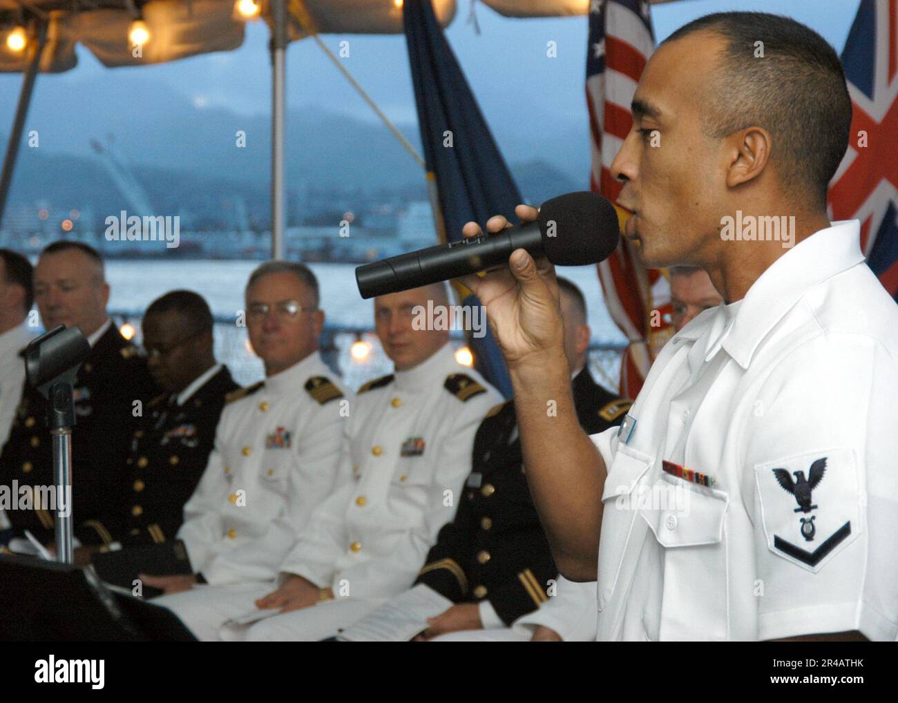 US Navy Musician 3rd Class sings a hymn at the Easter Sunrise Service ...