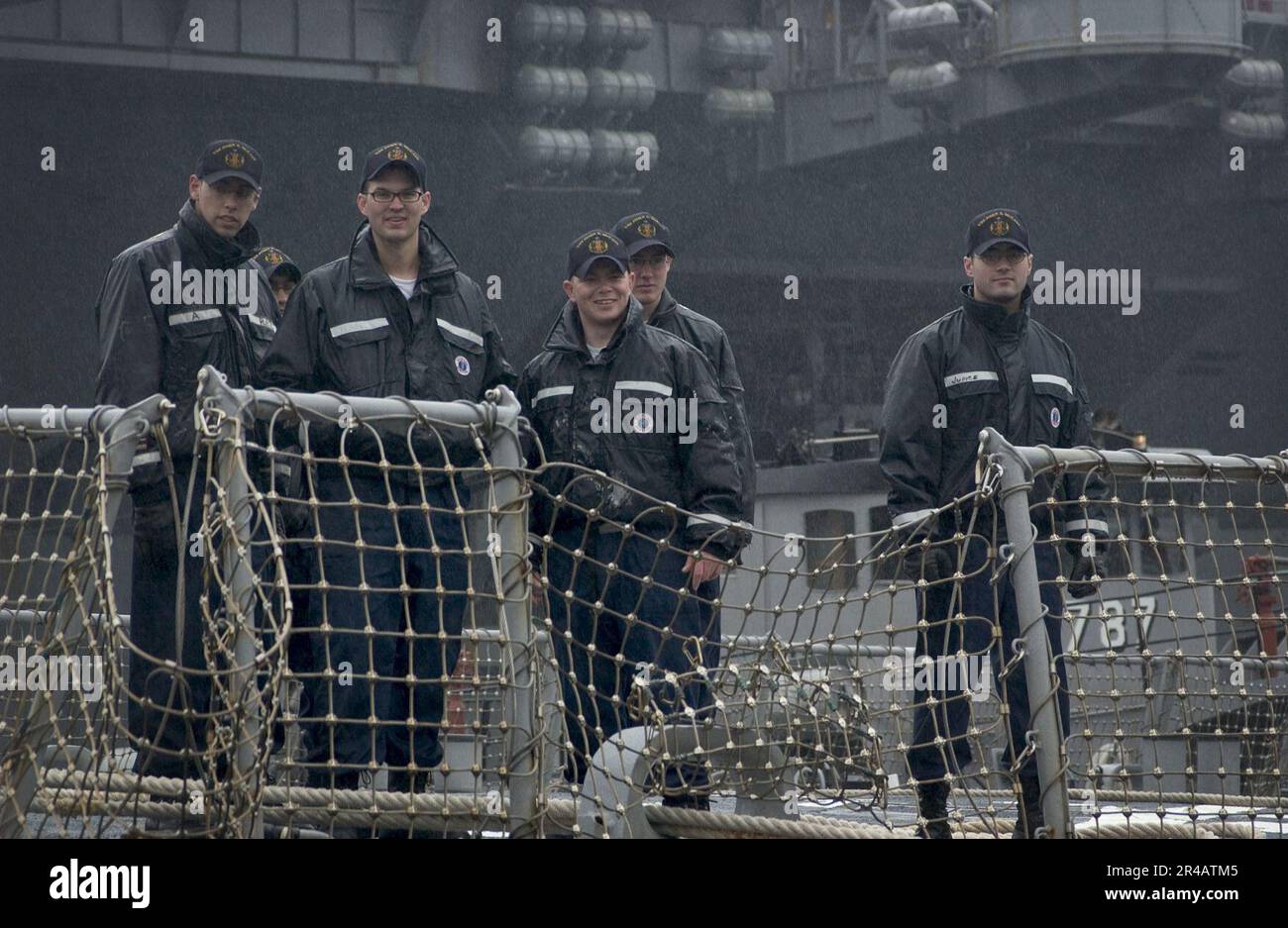 US Navy Sailors aboard the guided missile destroyer USS John S. McCain ...