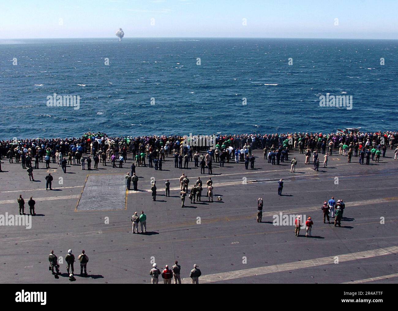 US Navy Sailors and Marines aboard USS Harry S. Truman (CVN 75) watch ...