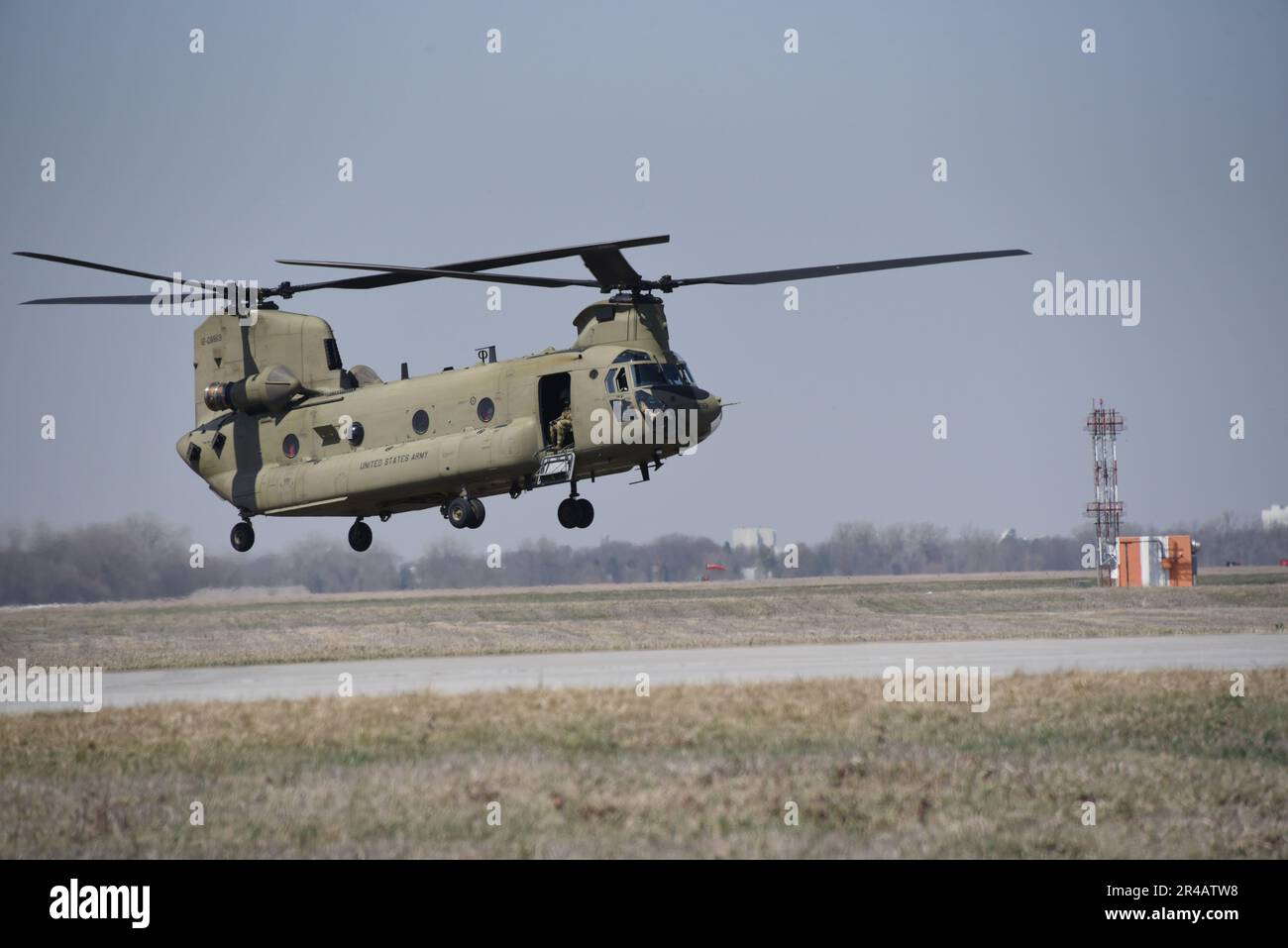 An Iowa Army National Guard CH-47 Chinook helicopter picks up a ...