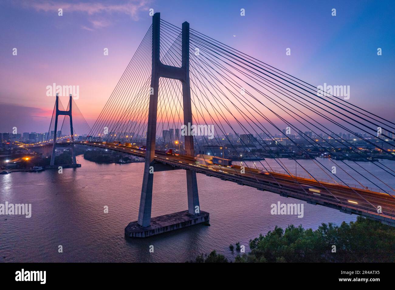 Sunset on Phu My bridge, Saigon river, Ho Chi Minh city, Vietnam Stock ...