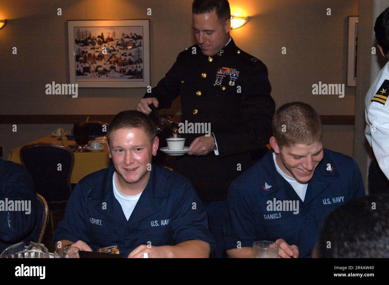 US Navy Marine Capt. center, serves Seaman left, and Culinary ...
