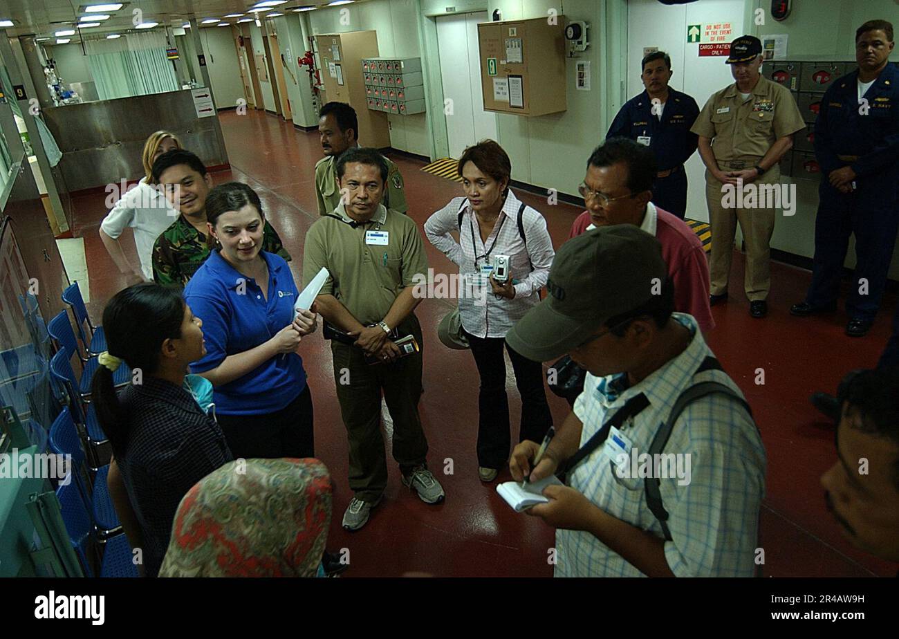 US Navy The Military Sealift Command (MSC) Public Affairs Officer, left ...