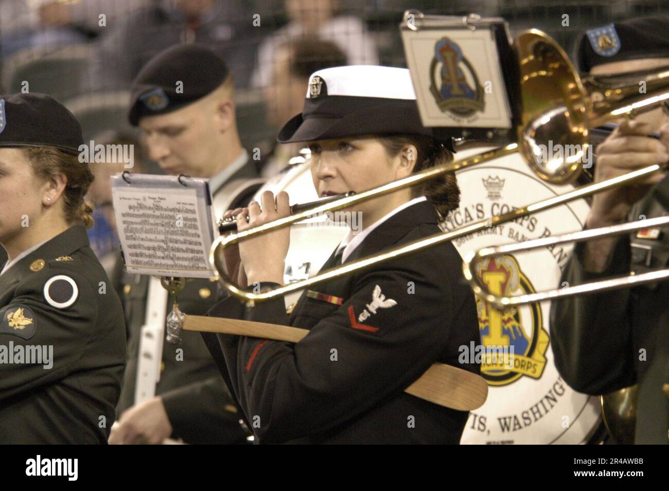 US Navy Musician 3rd Class plays the flute in the Joint Forces Band ...