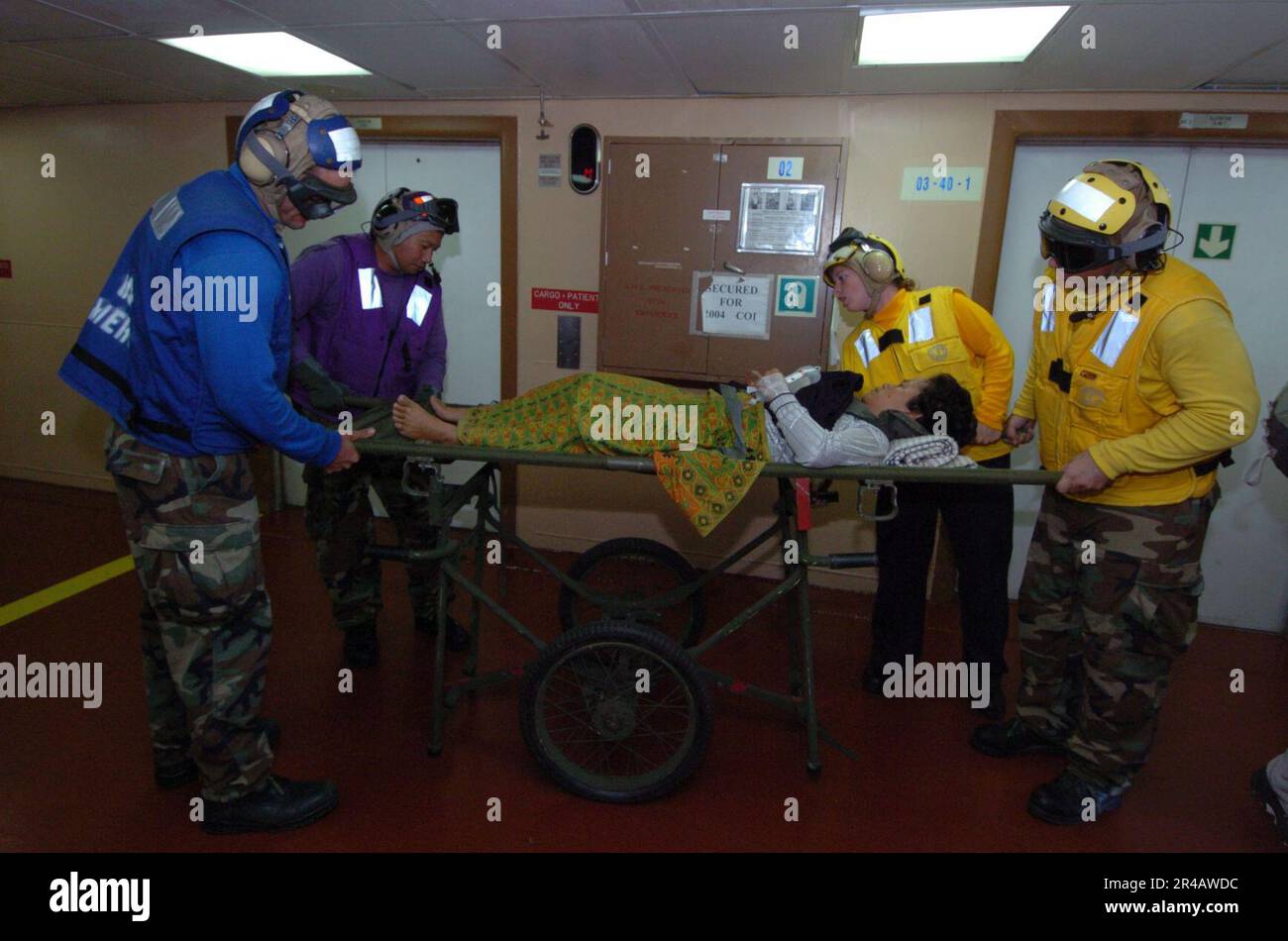US Navy Flight deck personnel aboard the Military Sealift Command (MSC ...