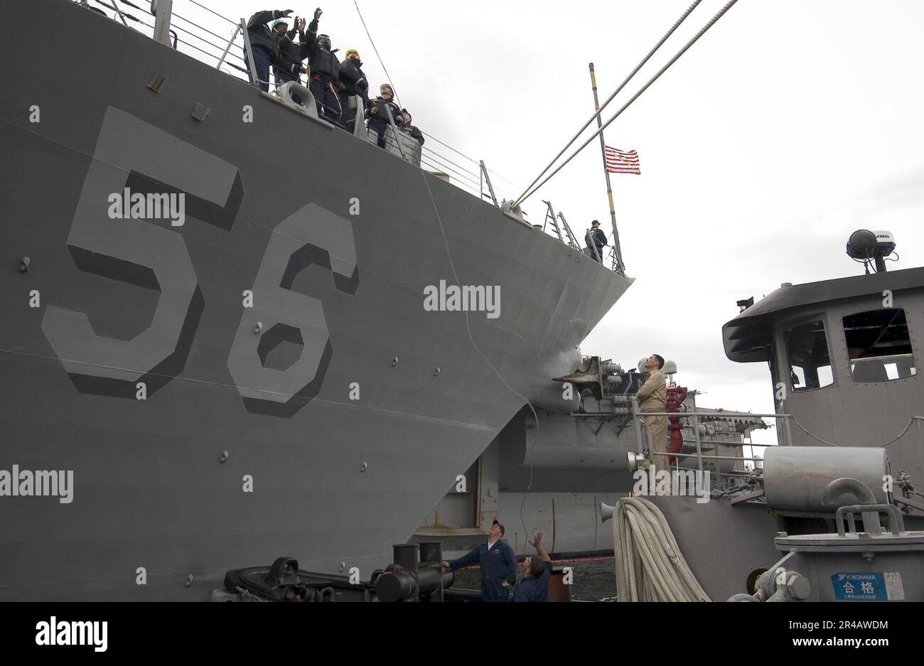 US Navy Sailors assigned to the large harbor tug USS Massapequa (YBT ...