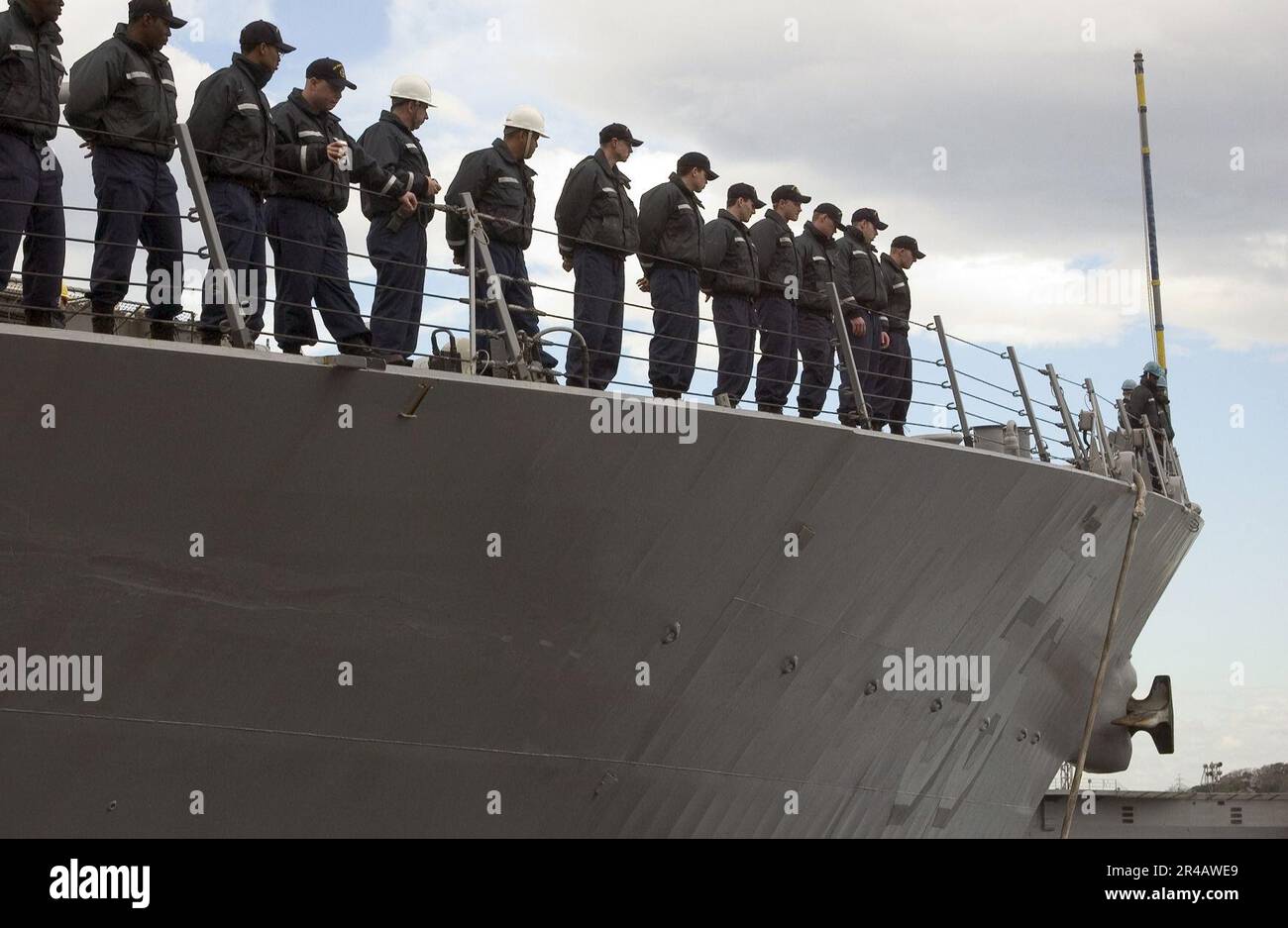 US Navy Sailors aboard the guided missile destroyer USS John S. McCain ...