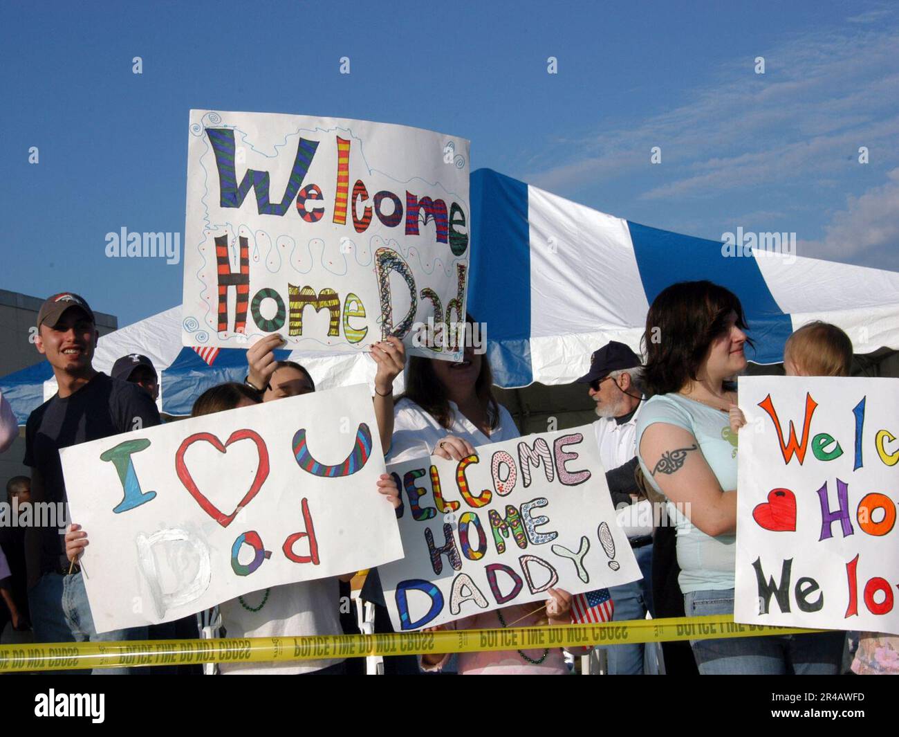 US Navy Family and friends of Sailors aboard the guided missile frigate ...