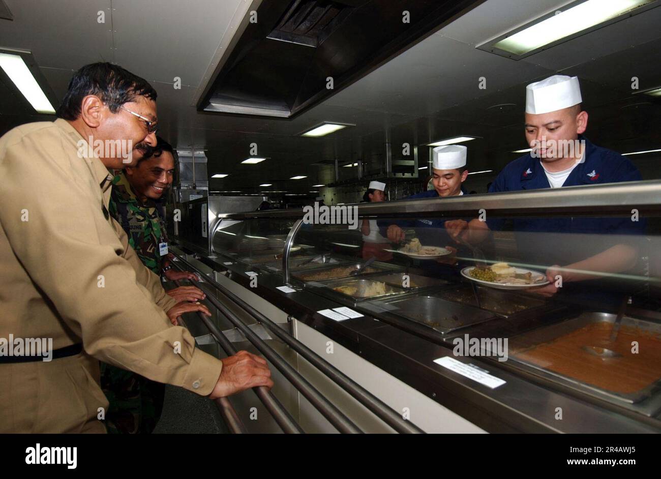 US Navy Culinary Specialist 2nd Class right, and Hospitalman Seaman ...