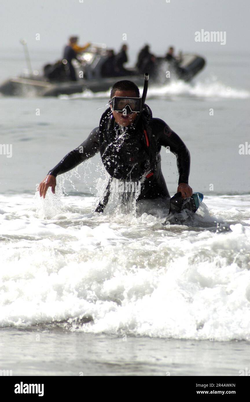 US Navy Aviation Warfare System Operator 2nd Class completes a swim ...
