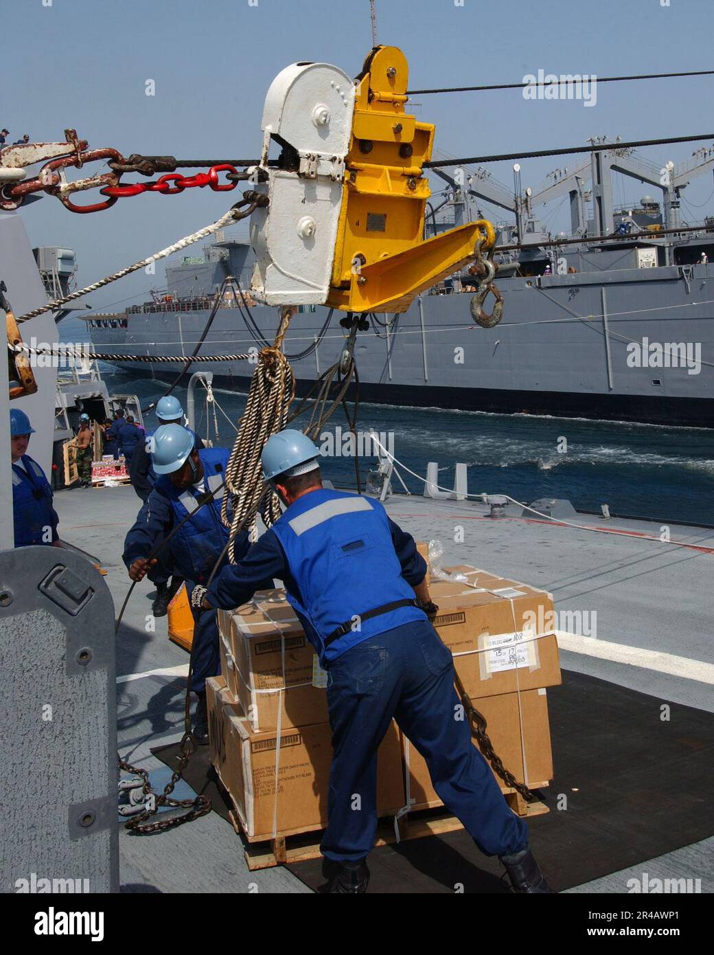 US Navy Sailors aboard the Arleigh Burke-class guided missile destroyer ...