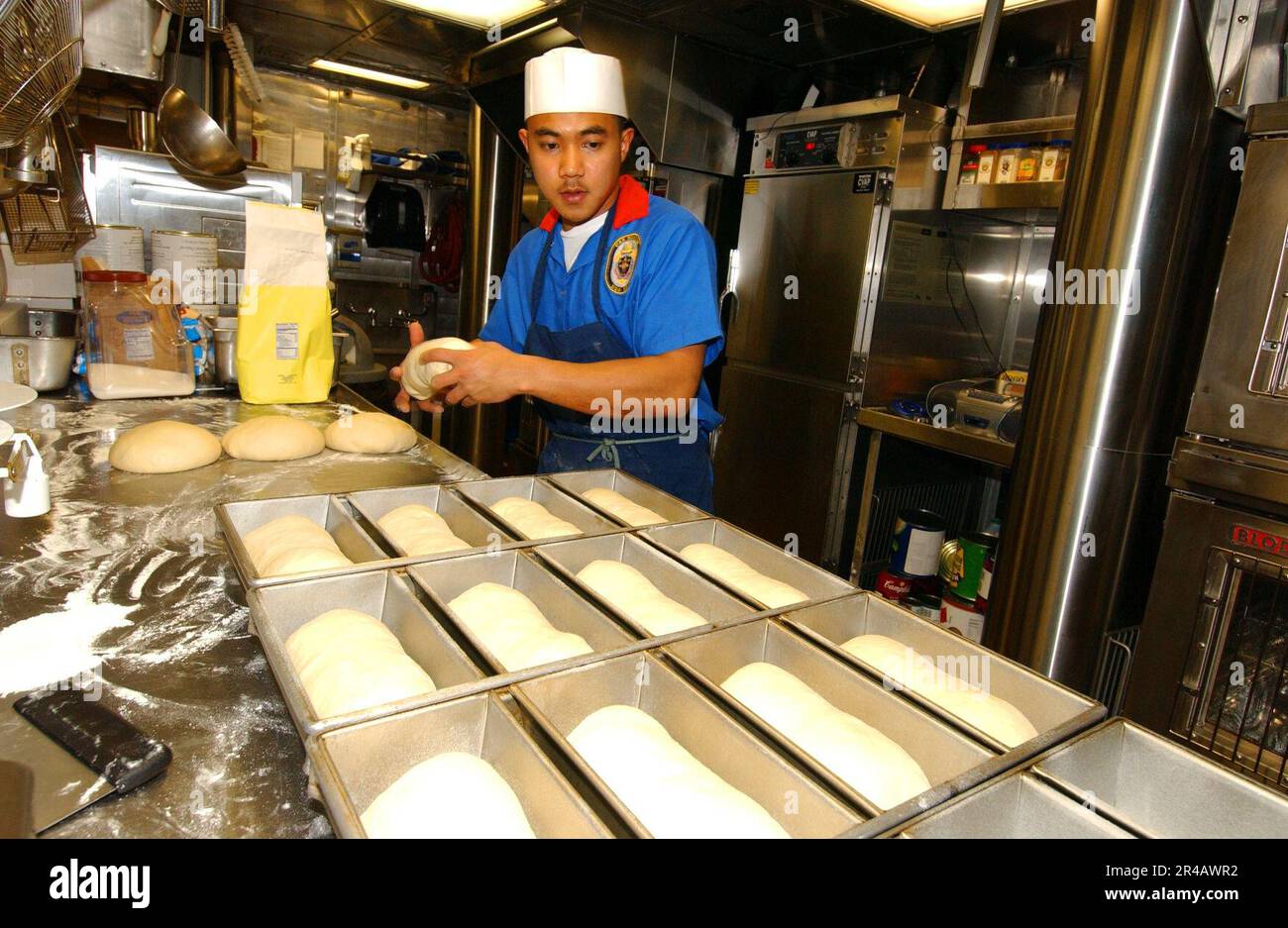US Navy Culinary Specialist 3rd Class assigned to the guided missile ...