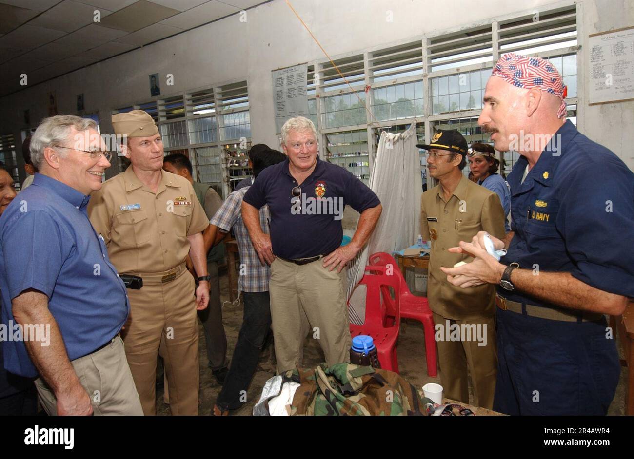 US Navy Cmdr. right, assigned to the Military Sealift Command (MSC ...