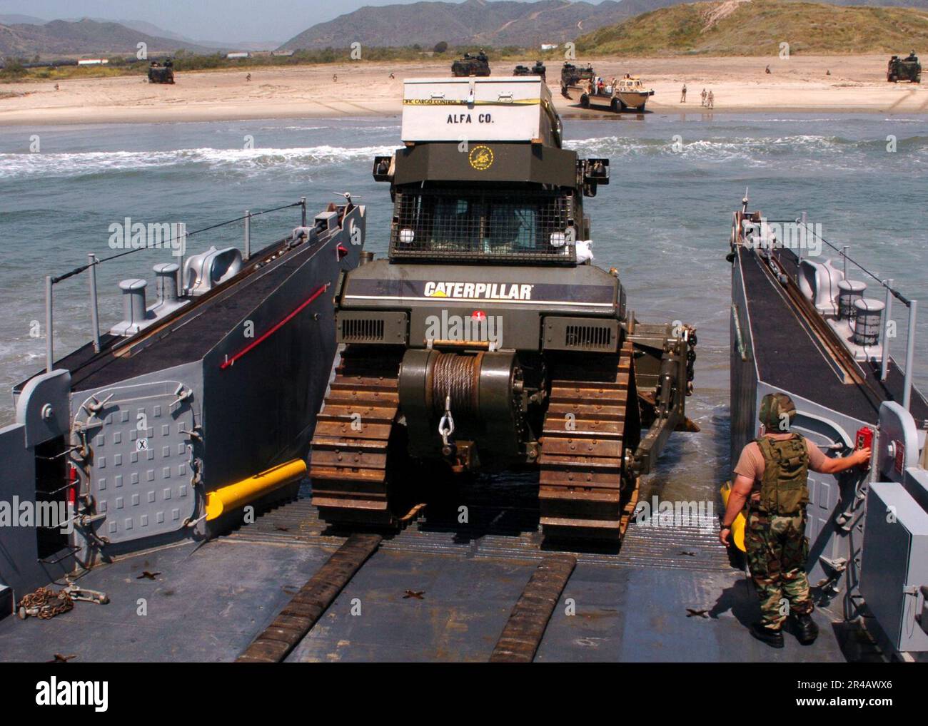 US Navy Seaman assigned to amphibious assault ship USS Tarawa (LHA-1 ...