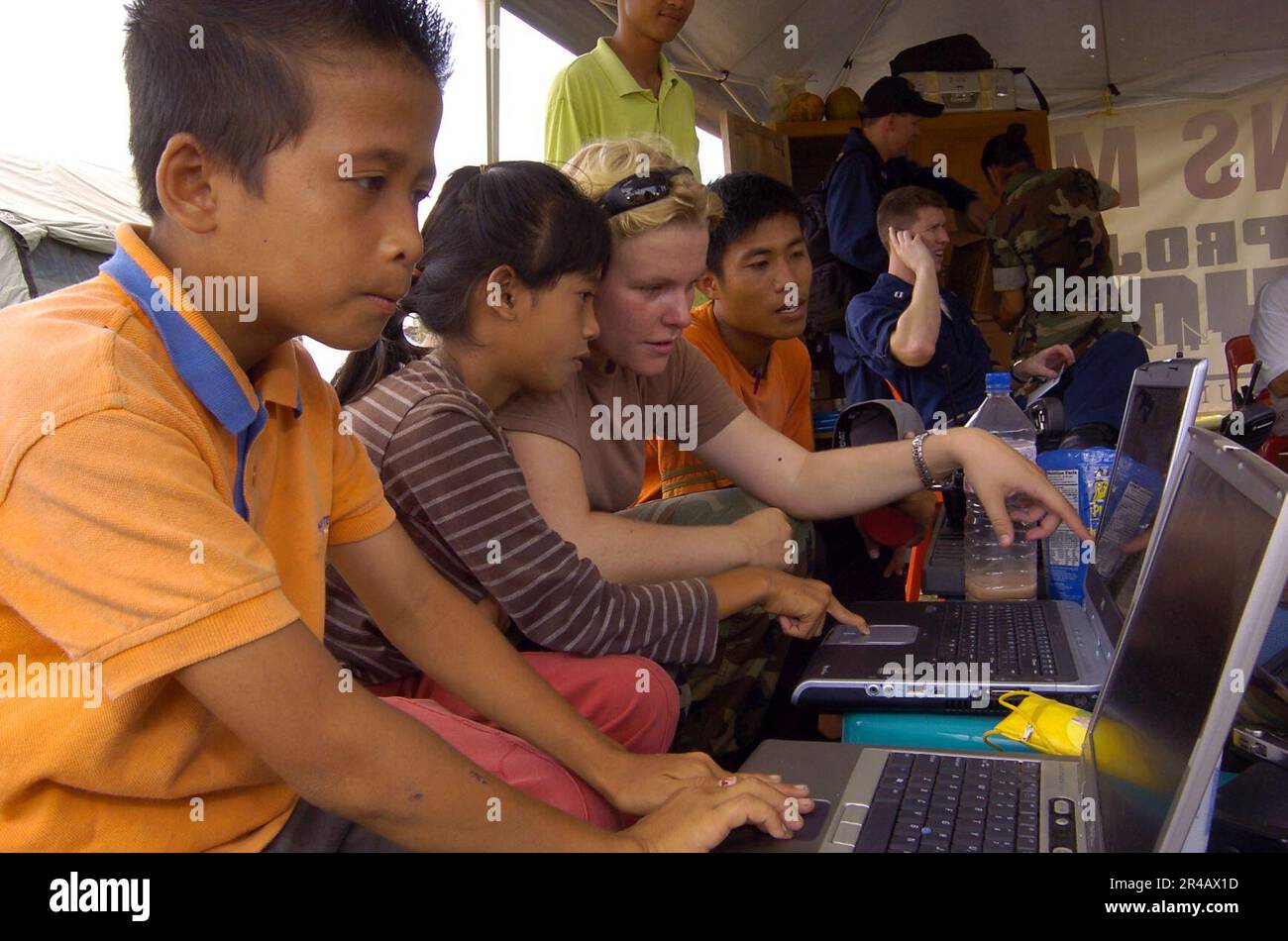 US Navy Master-At-Arms Seaman shares web surfing time with local ...
