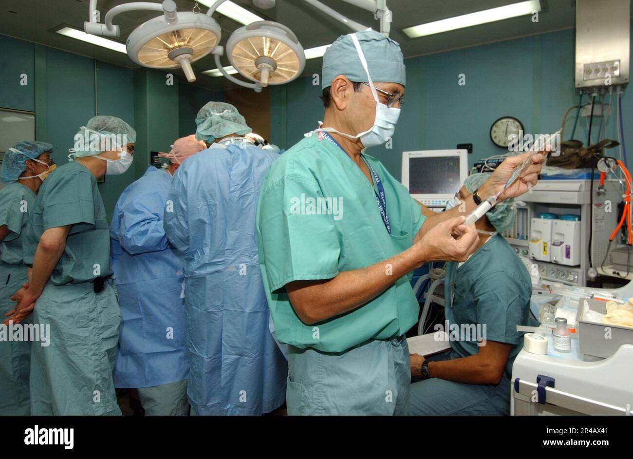 US Navy Dr. provides medication for an Indonesian patient as the ...