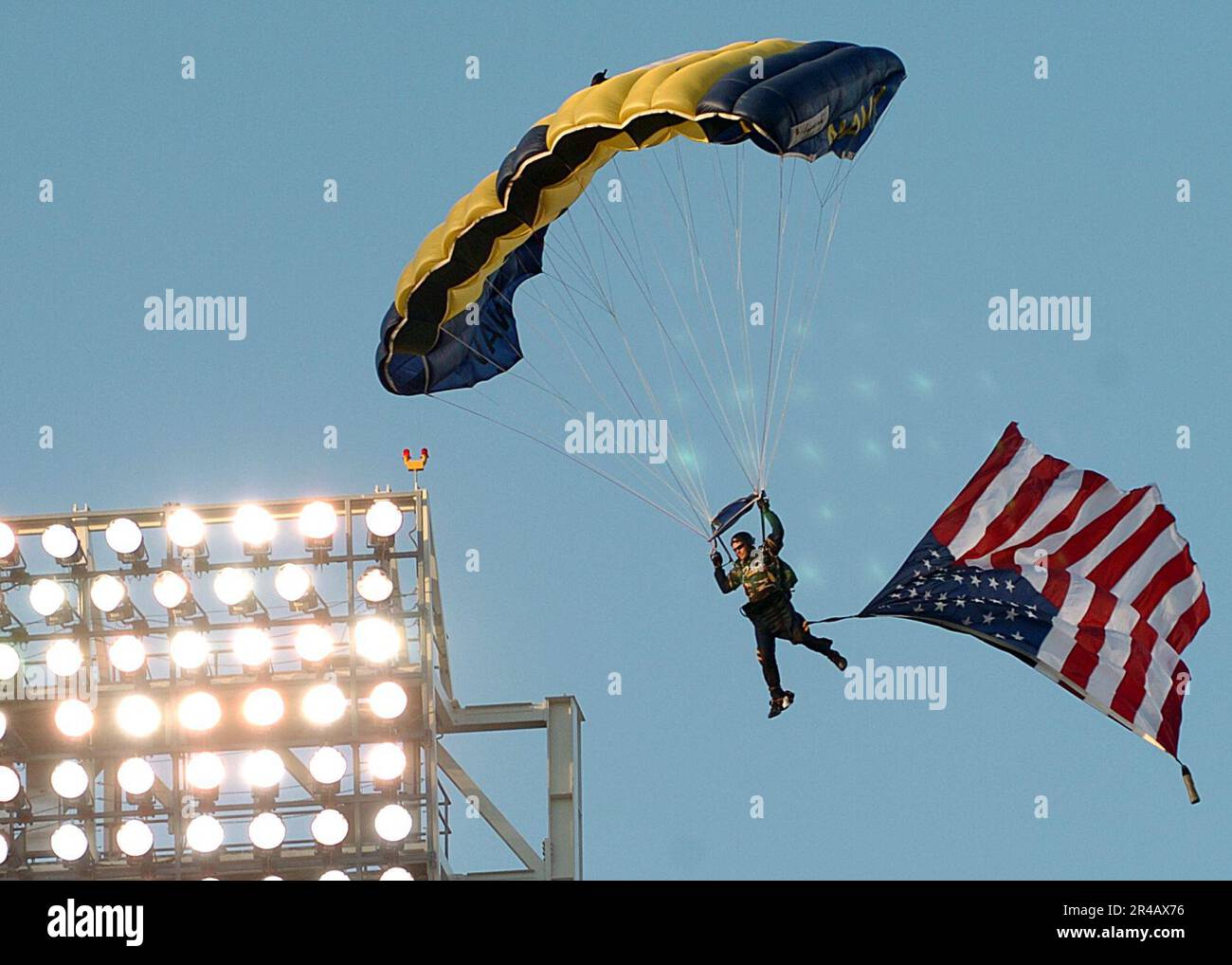 US Navy A Member of the U.S. Navy Parachute Team, the Leap Frogs ...