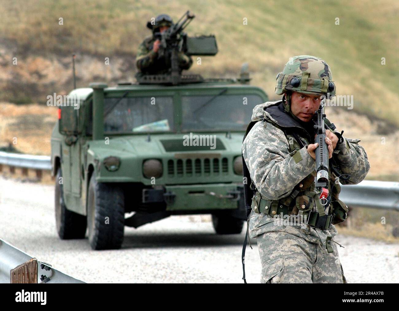 US Navy Builder 1st Class assigned to Naval Mobile Construction ...