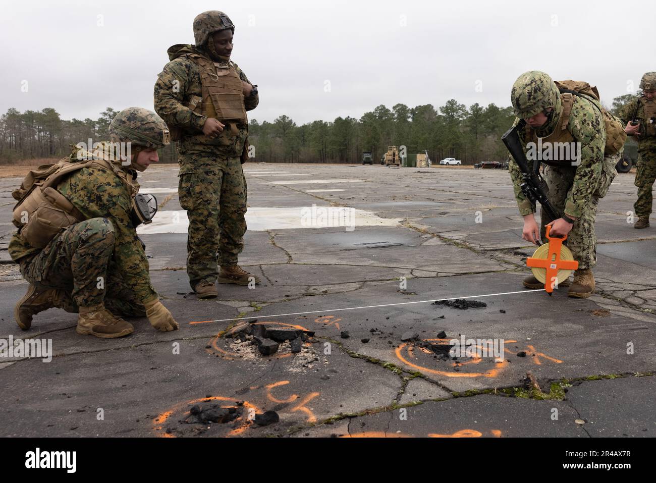 U.S. Marine Corps Cpl. Bradlee Roman, left, a combat engineer with 8th ...