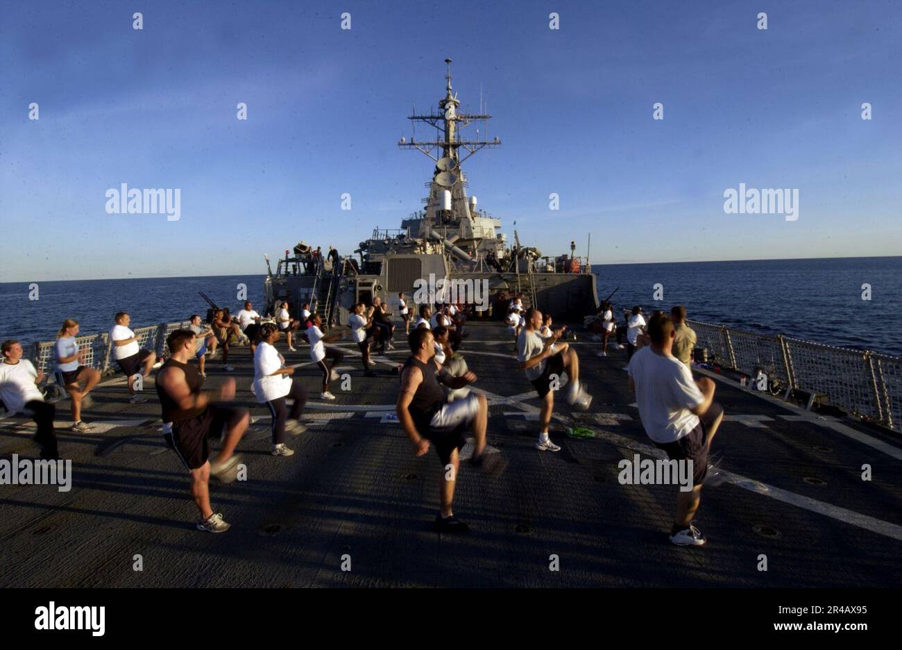 US Navy Sailors stationed aboard the Arleigh Burke class guided missile ...
