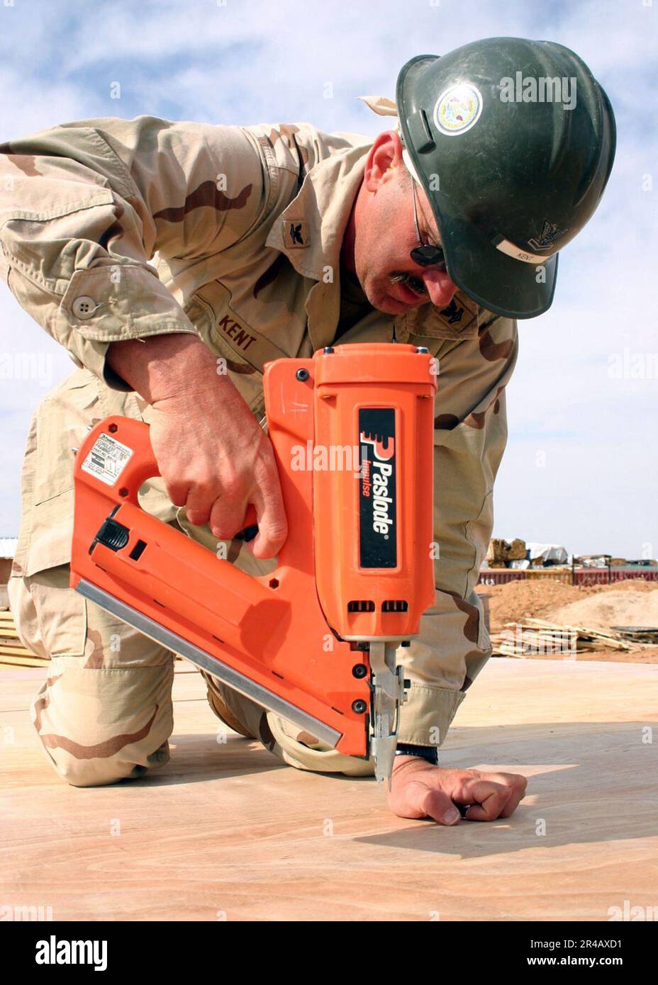 US Navy Utilitesman 2nd Class assigned to Naval Mobile Construction ...