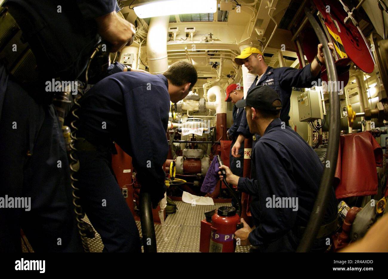 US Navy Engineering Department personnel assigned the guided missile ...