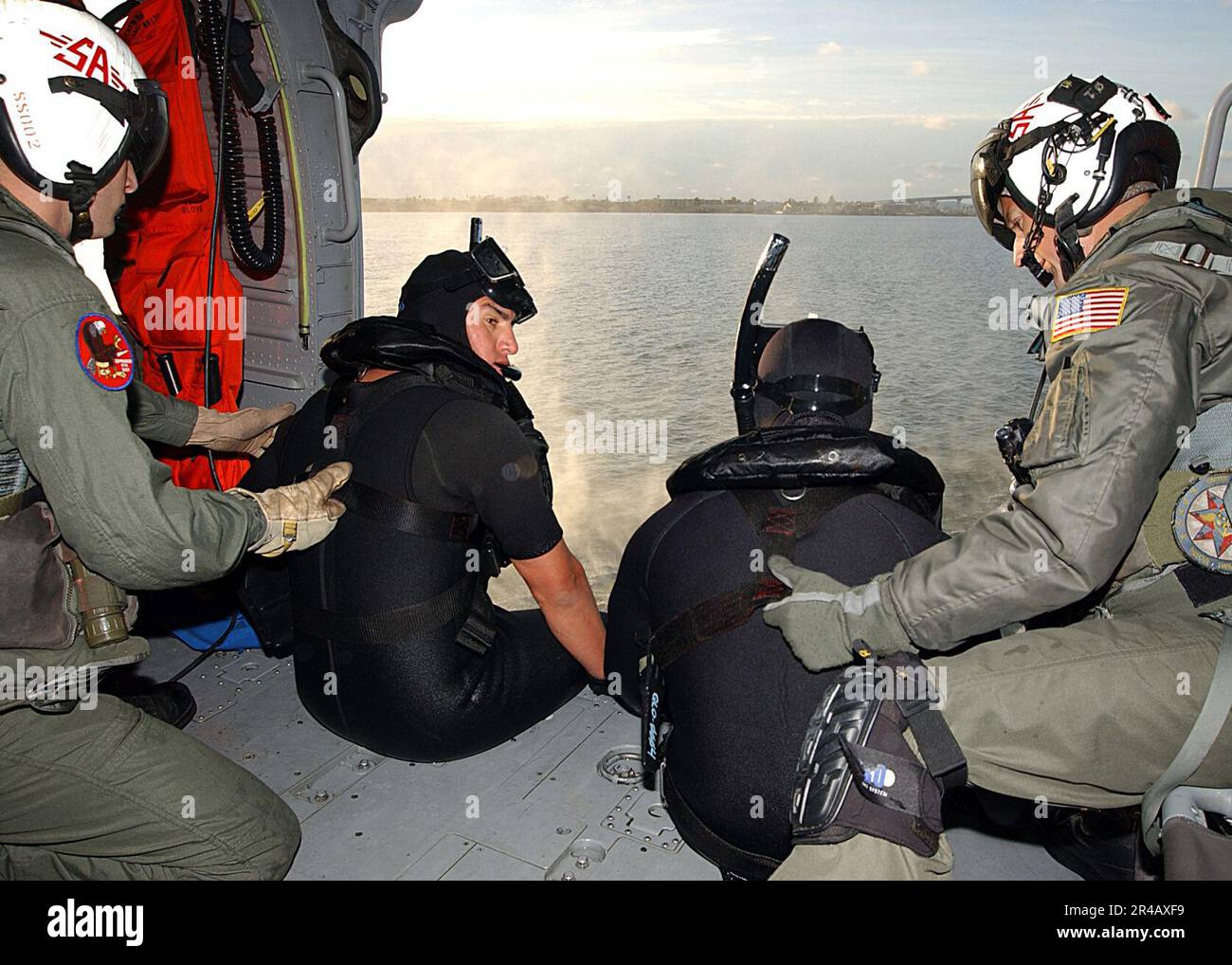 US Navy Aviation Structural Mechanic 3rd Class far left, and Aviation Structural Mechanic 1st ...