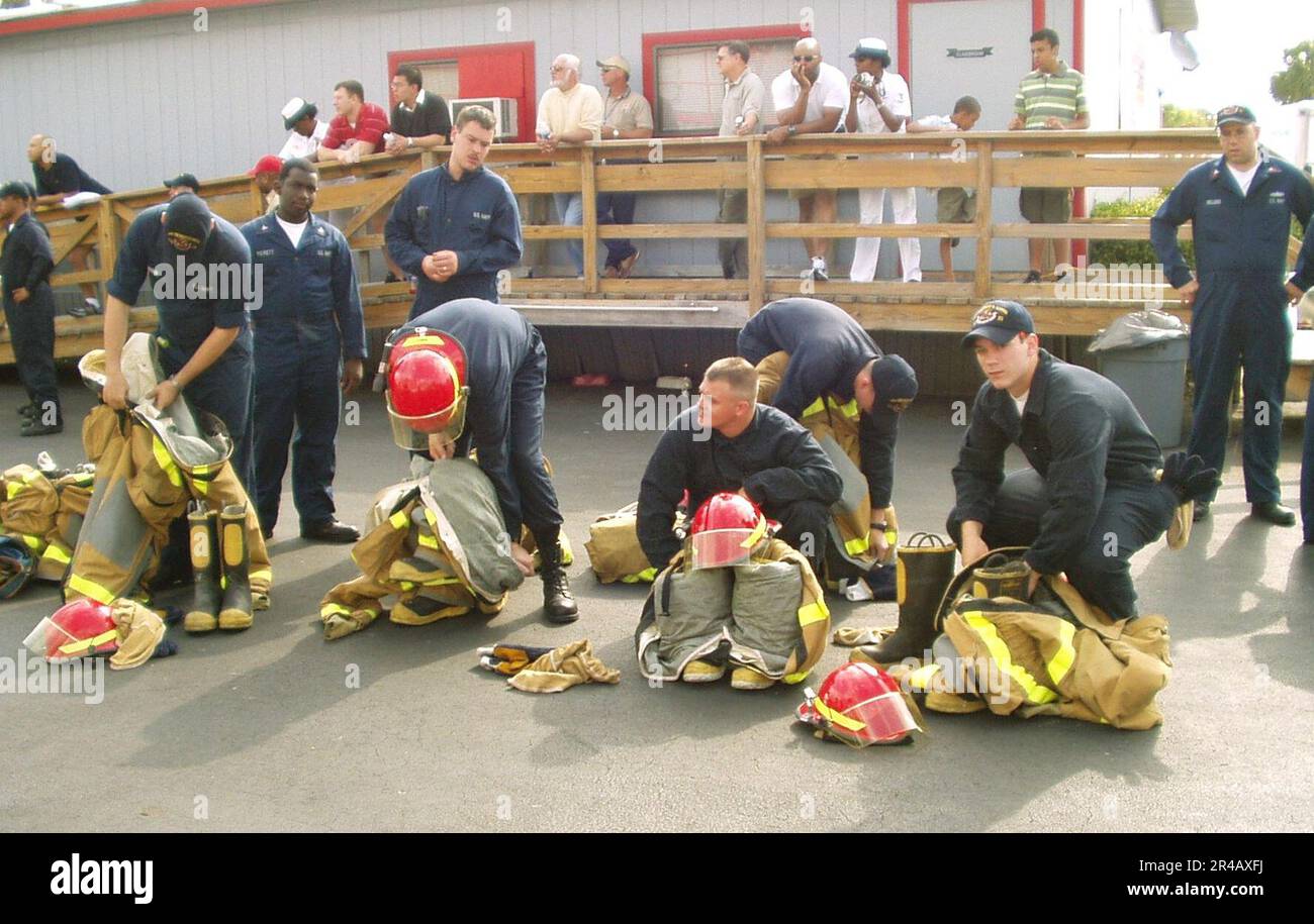 US Navy Several Damage Controlmen prepare to participate in a Damage ...