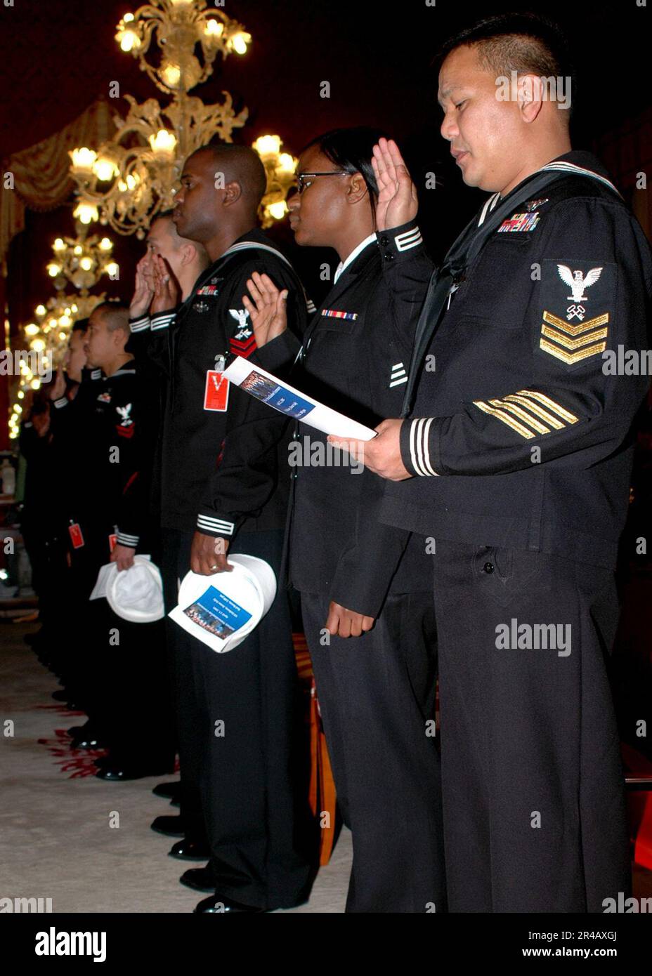 US Navy Storekeeper 1st Class takes the oath of allegiance during a ...