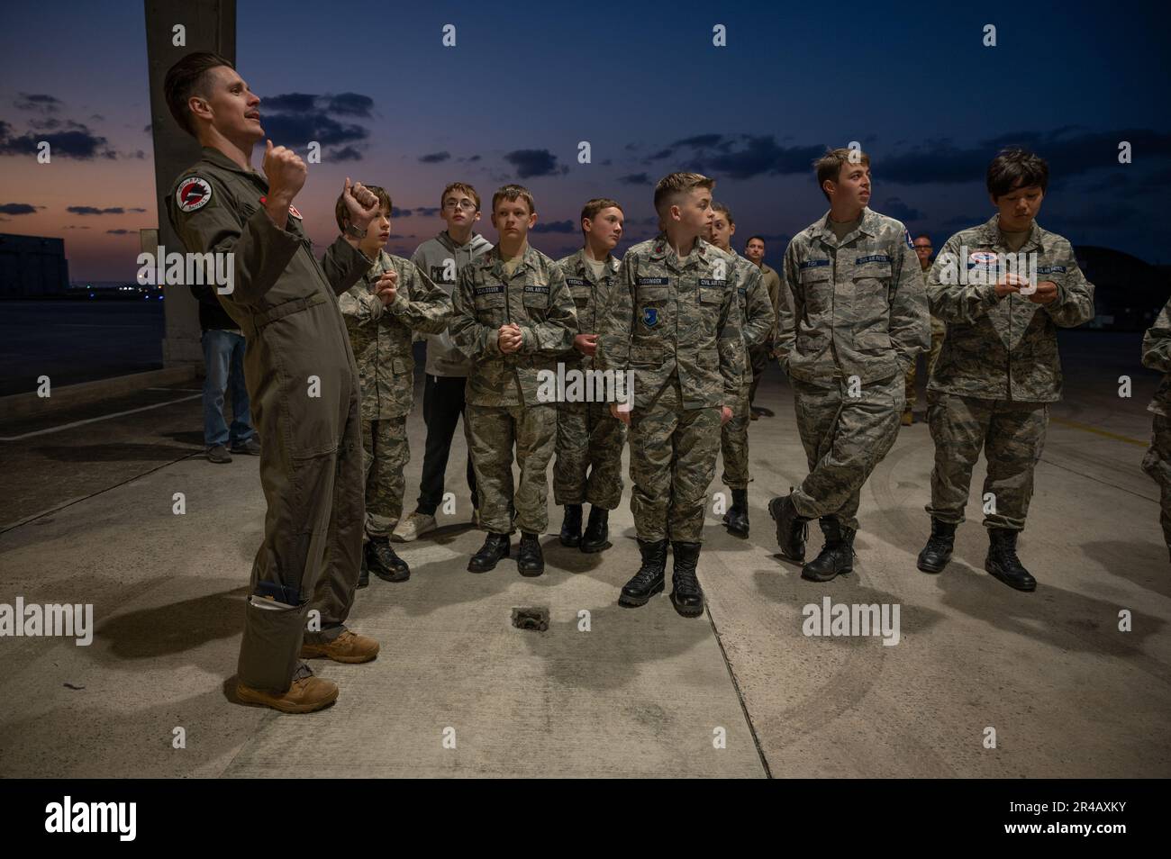 Cadets from the Civil Air Patrol Okinawa Cadet Squadron listen as an F ...