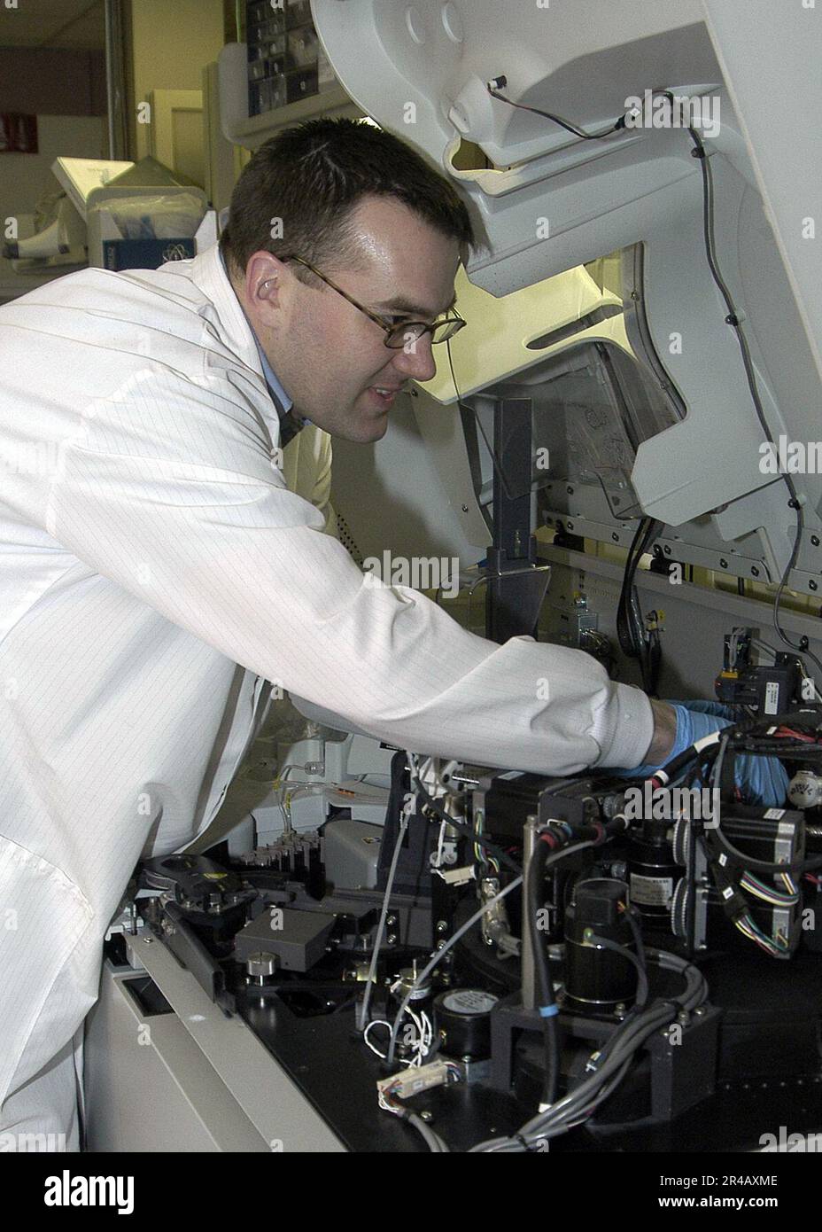 US Navy Hospital Corpsman 3rd Class aligns probes in a chemistry ...