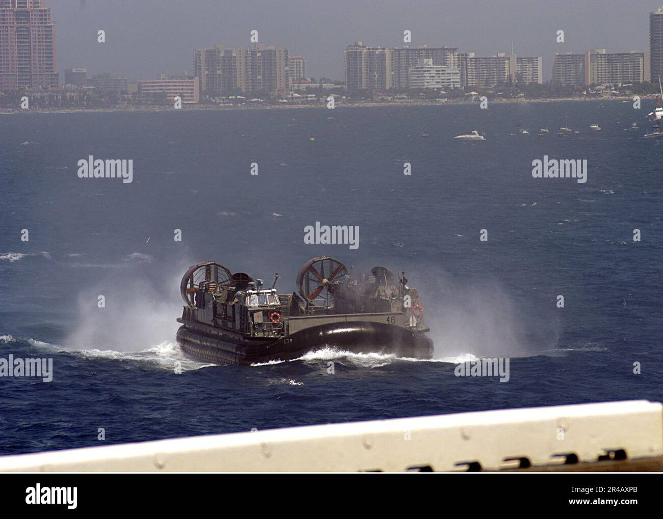 US Navy A Landing Craft Air Cushioned (LCAC) attached to Assault Craft ...
