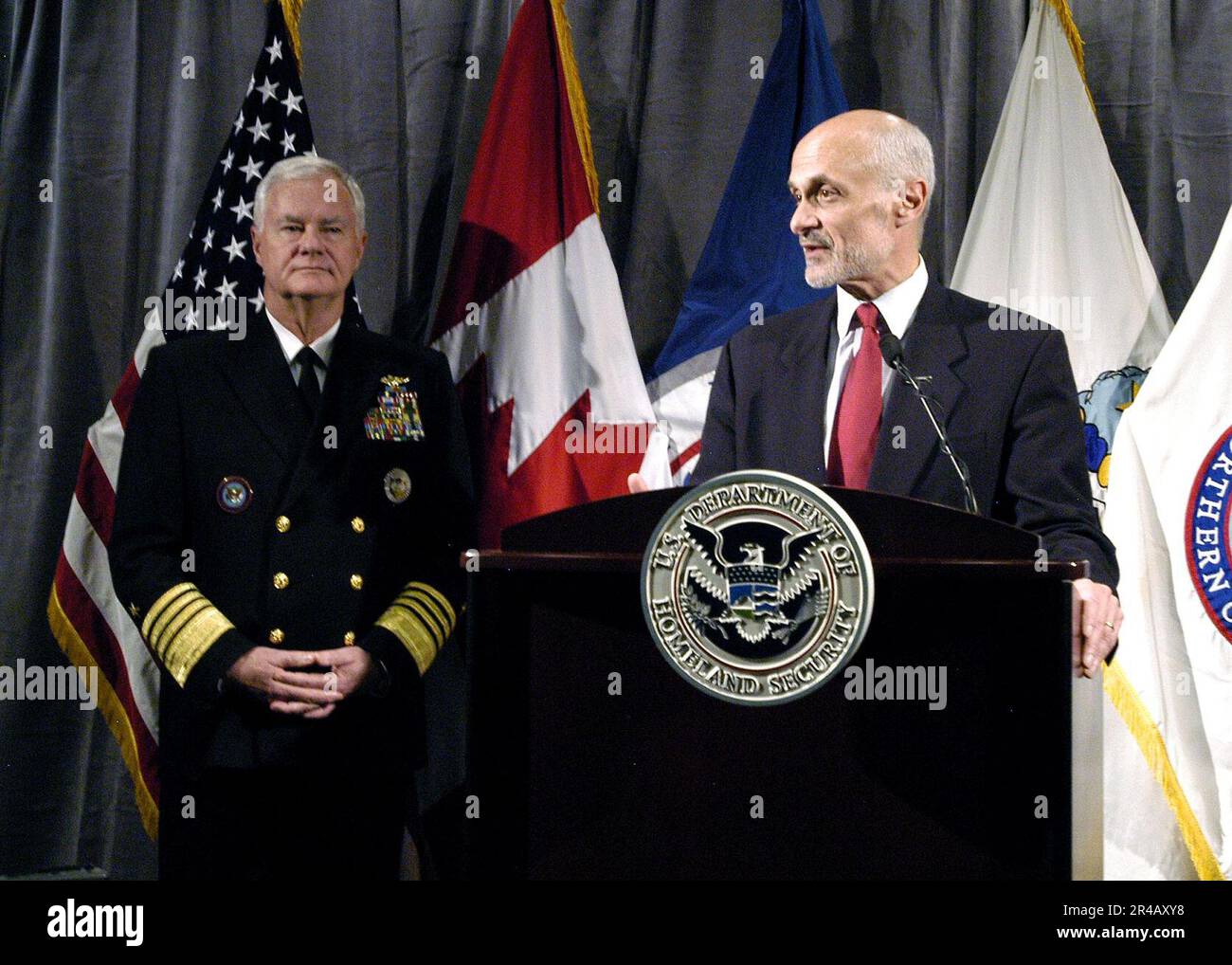 US Navy Homeland Security Secretary Michael Chertoff talks with local ...