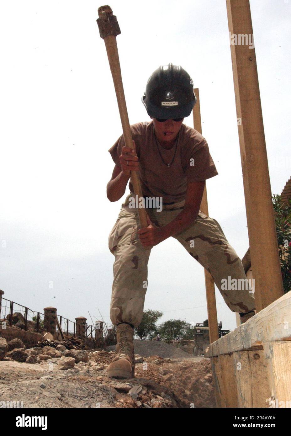 US Navy Builder 3rd Class assigned to Naval Mobile Construction ...