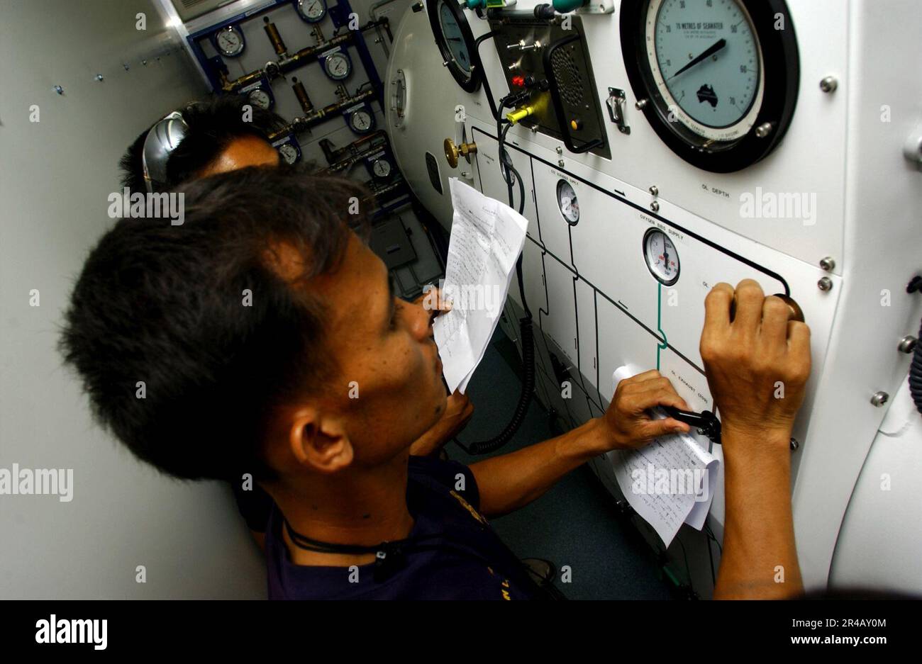 US Navy Royal Thai Navy divers from the Thai Diving School, check ...