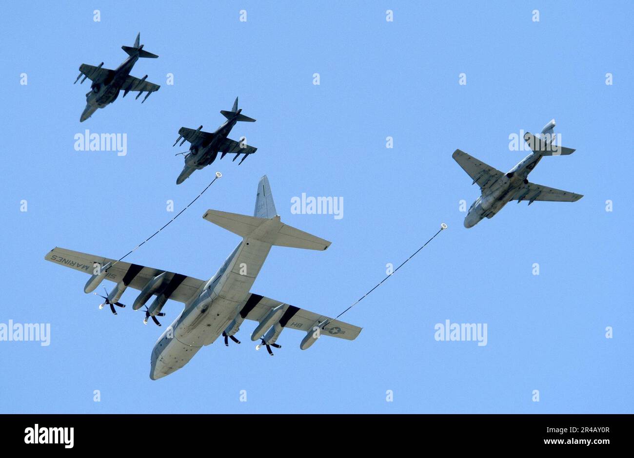 US Navy A KC-130J Hercules simulates aerial refueling with an EA-6B ...