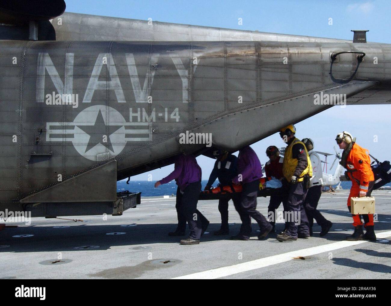 US Navy Stretcher bearers assigned to the amphibious transport dock ...