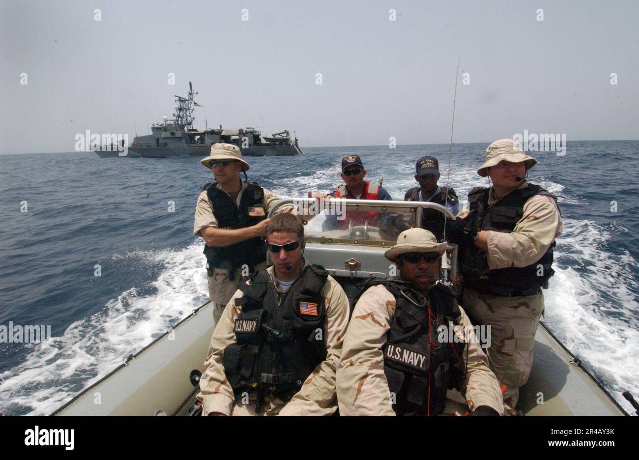US Navy Boarding team members assigned to the guided missile cruiser ...
