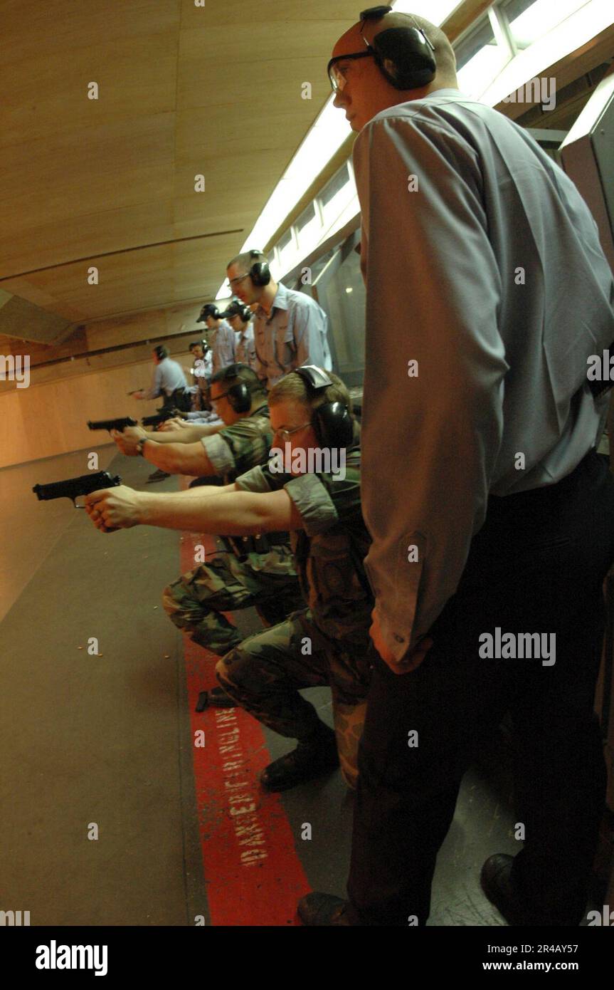 US Navy Line coaches observe USS Kitty Hawk (CV 63) personnel during a ...