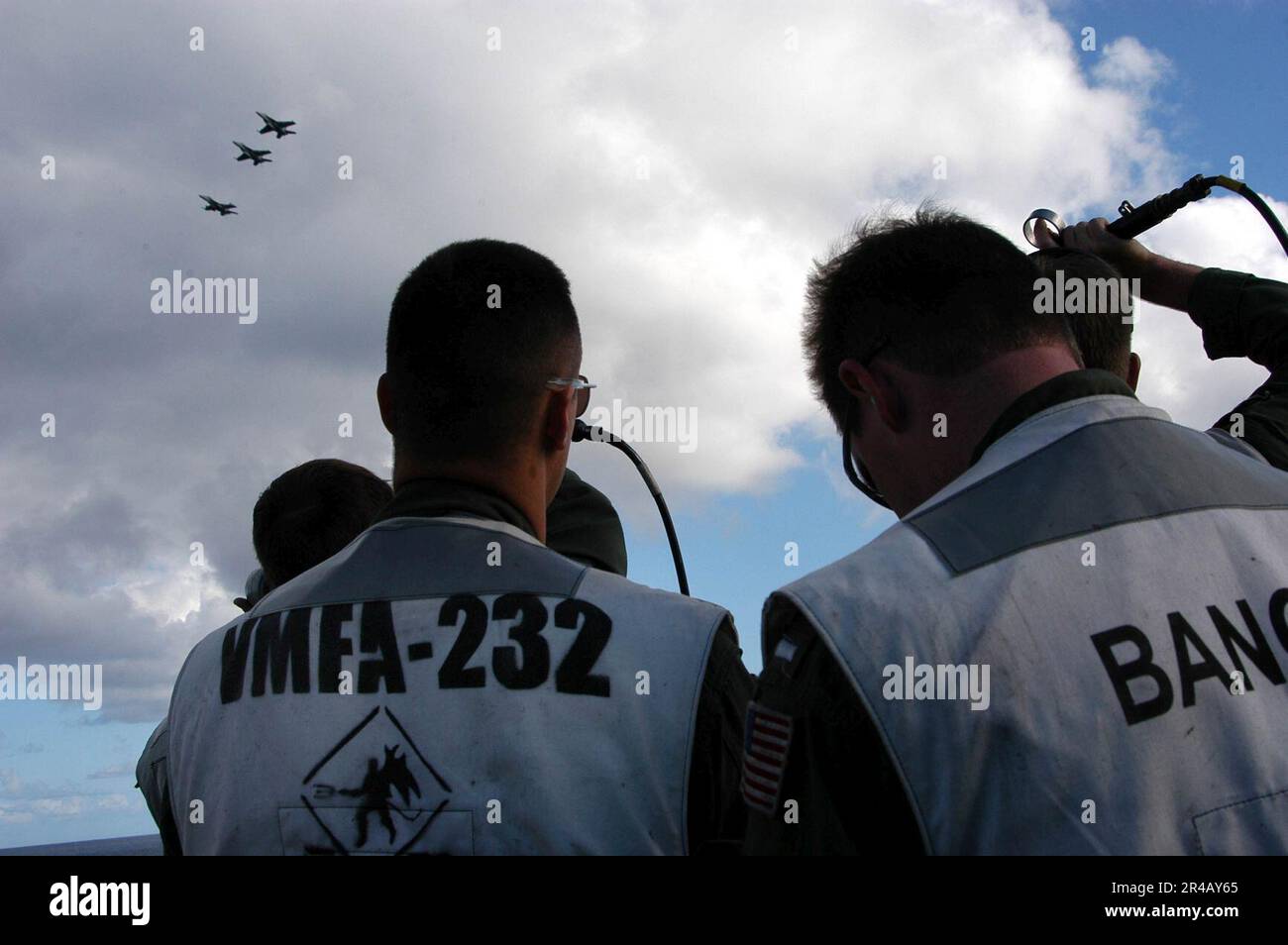 US Navy Pilots man the Land Signal Officer (LSO) platform during flight ...