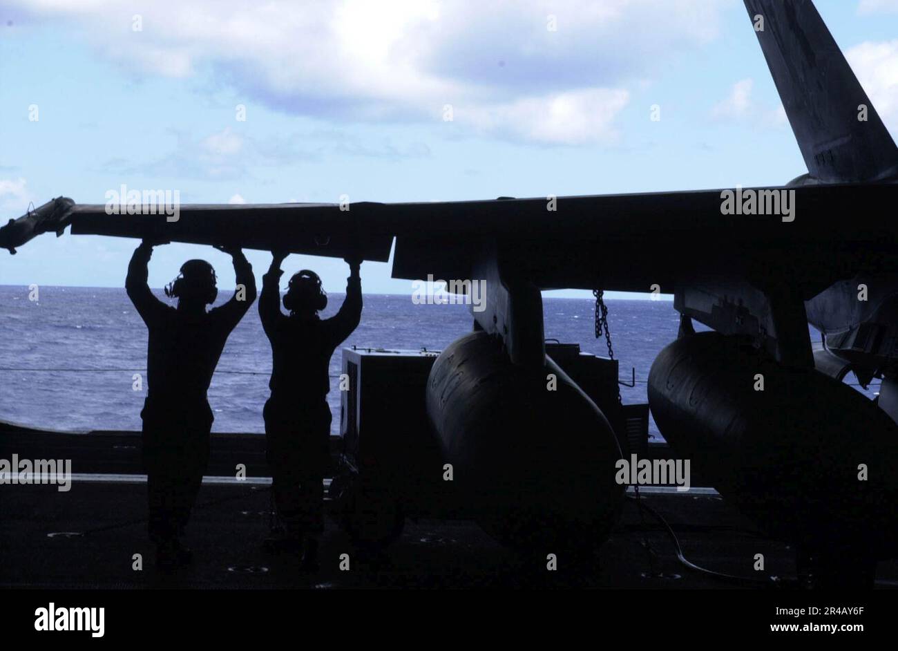 US Navy Sailors stationed aboard the nuclear-powered aircraft carrier ...