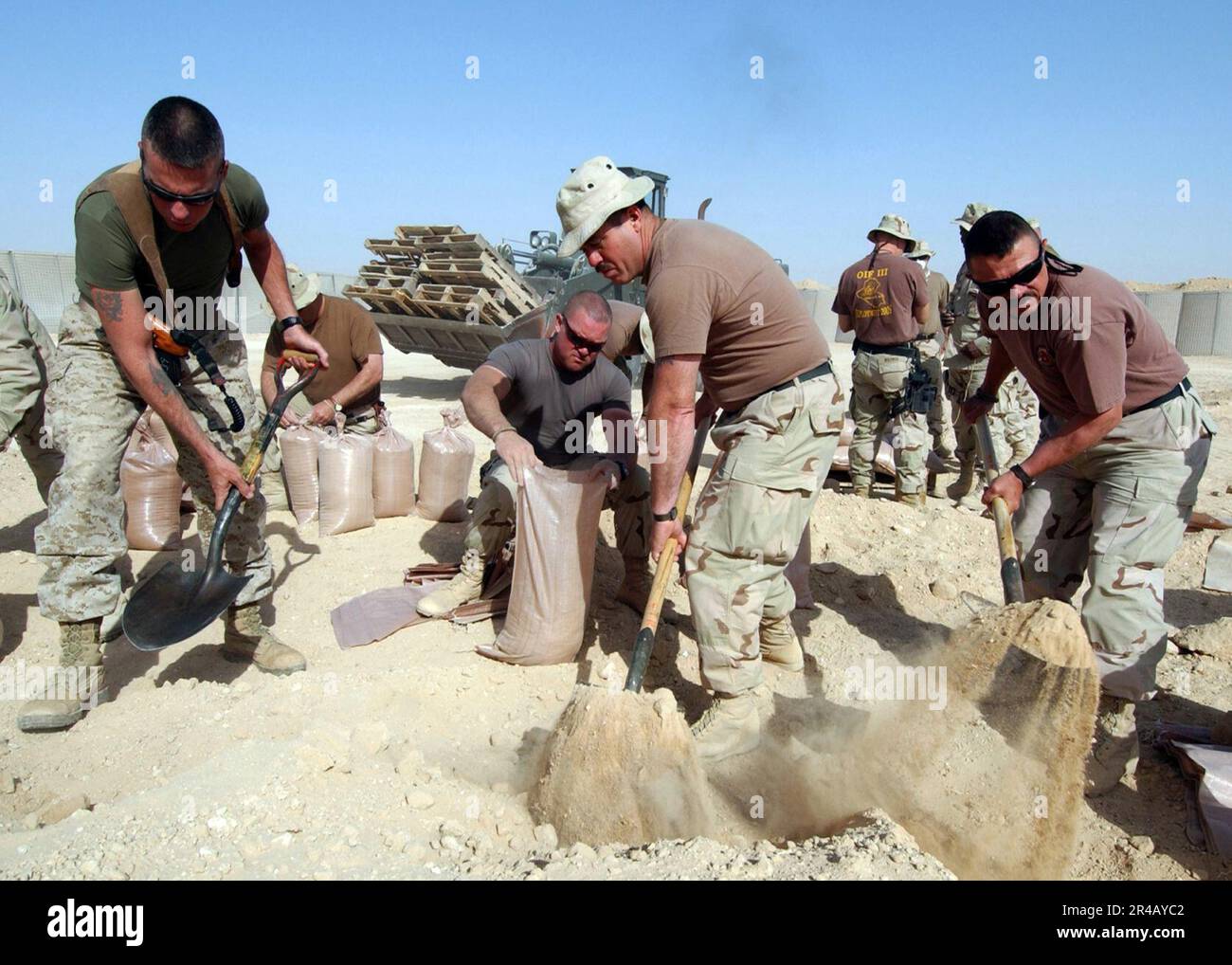 US Navy From left, U.S. Marine Corps Gunnery Sgt. Constructionman 1st ...
