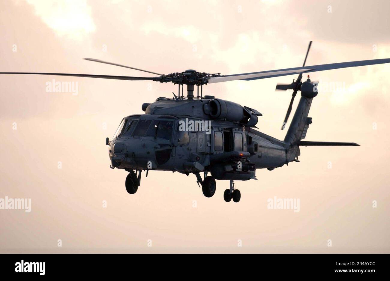 US Navy An HH-60H Seahawk helicopter prepares for landing on the flight deck aboard USS Nimitz ...