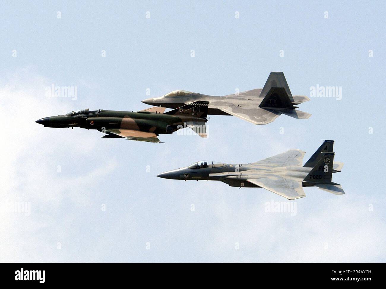 US Navy An F-4 Phantom flies in formation with an F-A-22 Raptor and F ...